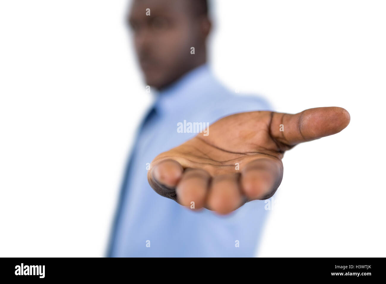 Businessman showing his hand Stock Photo - Alamy