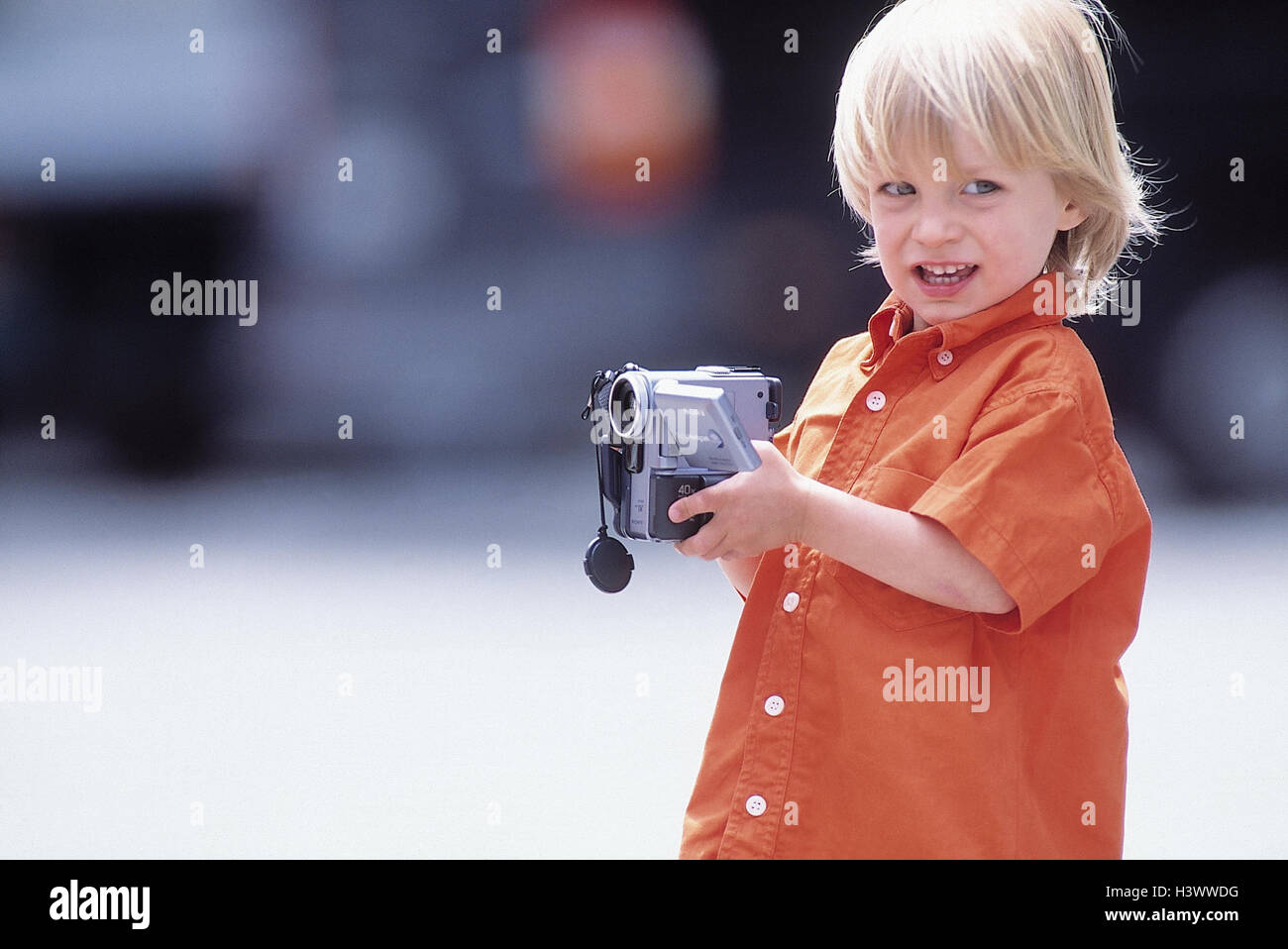 Town, child, happy, video camera, half portrait, outside, boy, girl ...