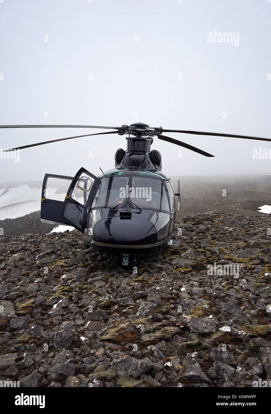 A landed helicopter, a type of rotorcraft in which lift and thrust are ...