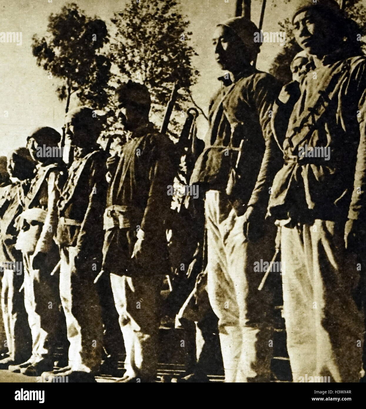 Photograph of a small platoon of Communist Chinese troops. Dated 20th ...
