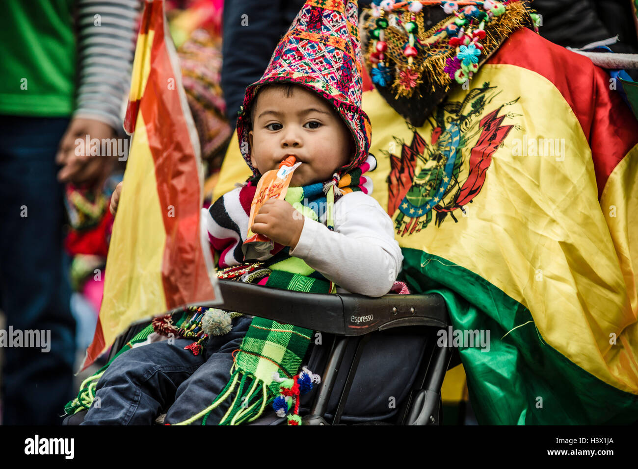 Barcelona, Spain. 12th October, 2016: A little Bolivian boy in a the ...