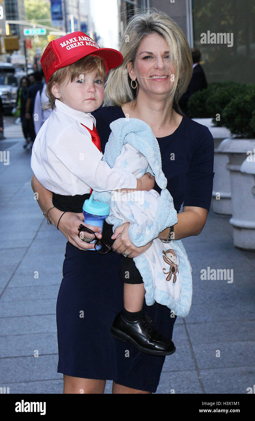 New York, USA. 12th October, 2016. Mini-Trump Hunter Tirpak and Jessica ...