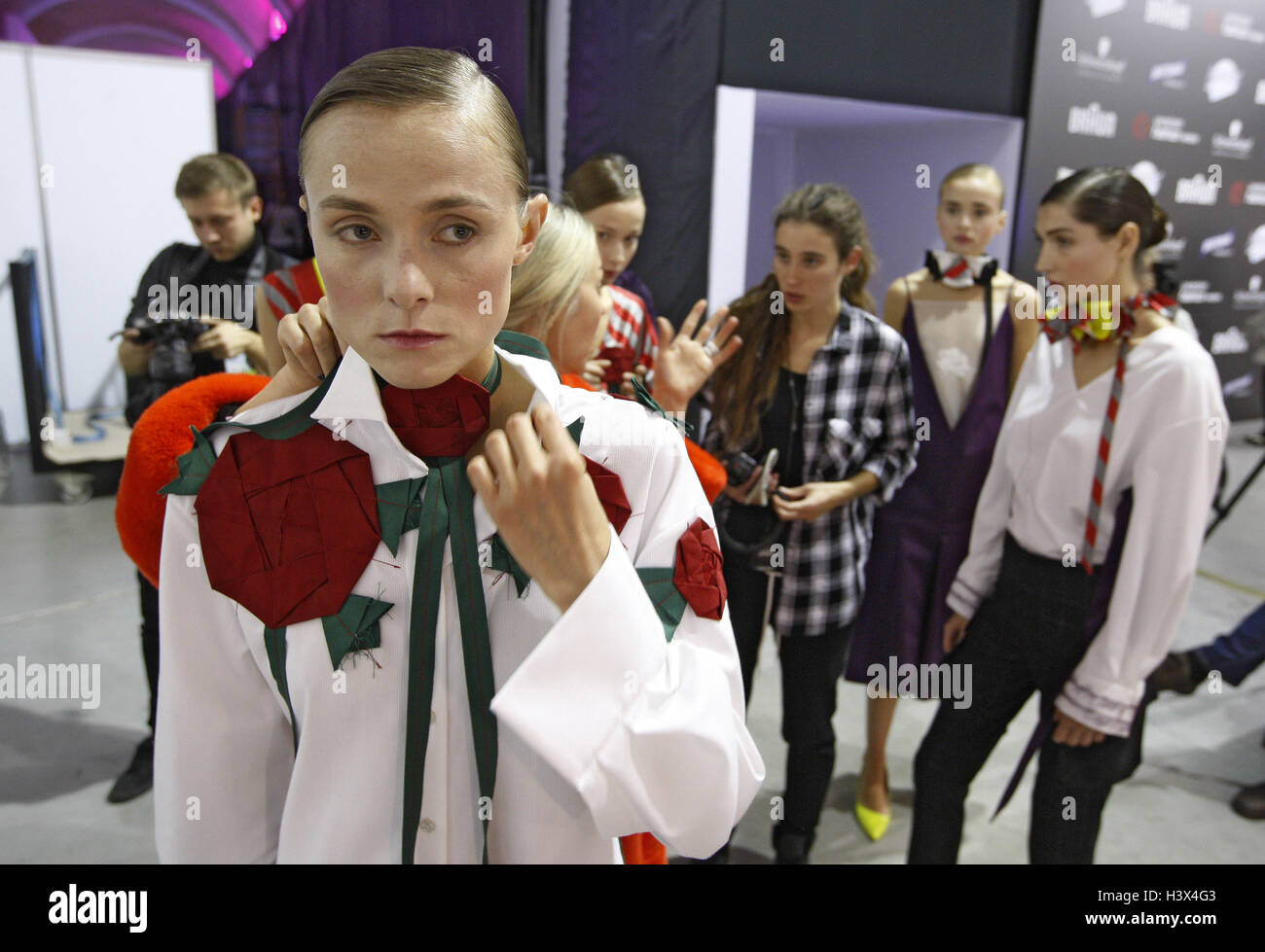 Kiev, Ukraine. 12th Oct, 2016. Models wait backstage during the ...