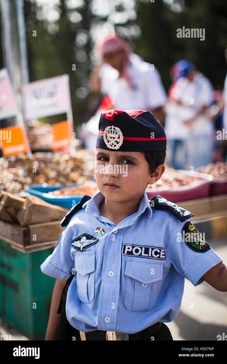 Amman, Amman, Jordan. 3rd June, 2016. A Jordanian boy wearing a police ...