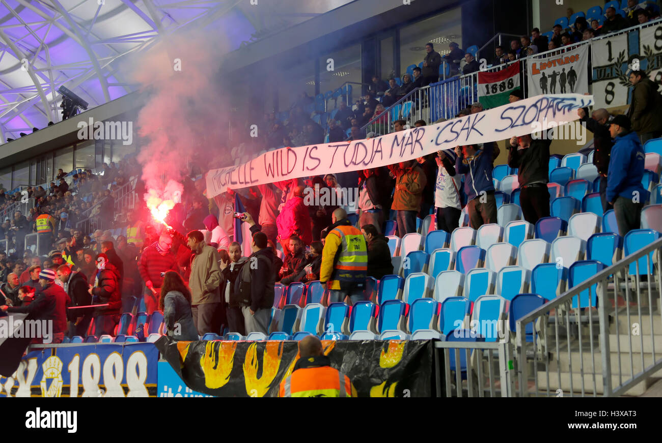 Budapest, Hungary. 13th Oct, 2016. The ultra fans of MTK Budapest watch ...