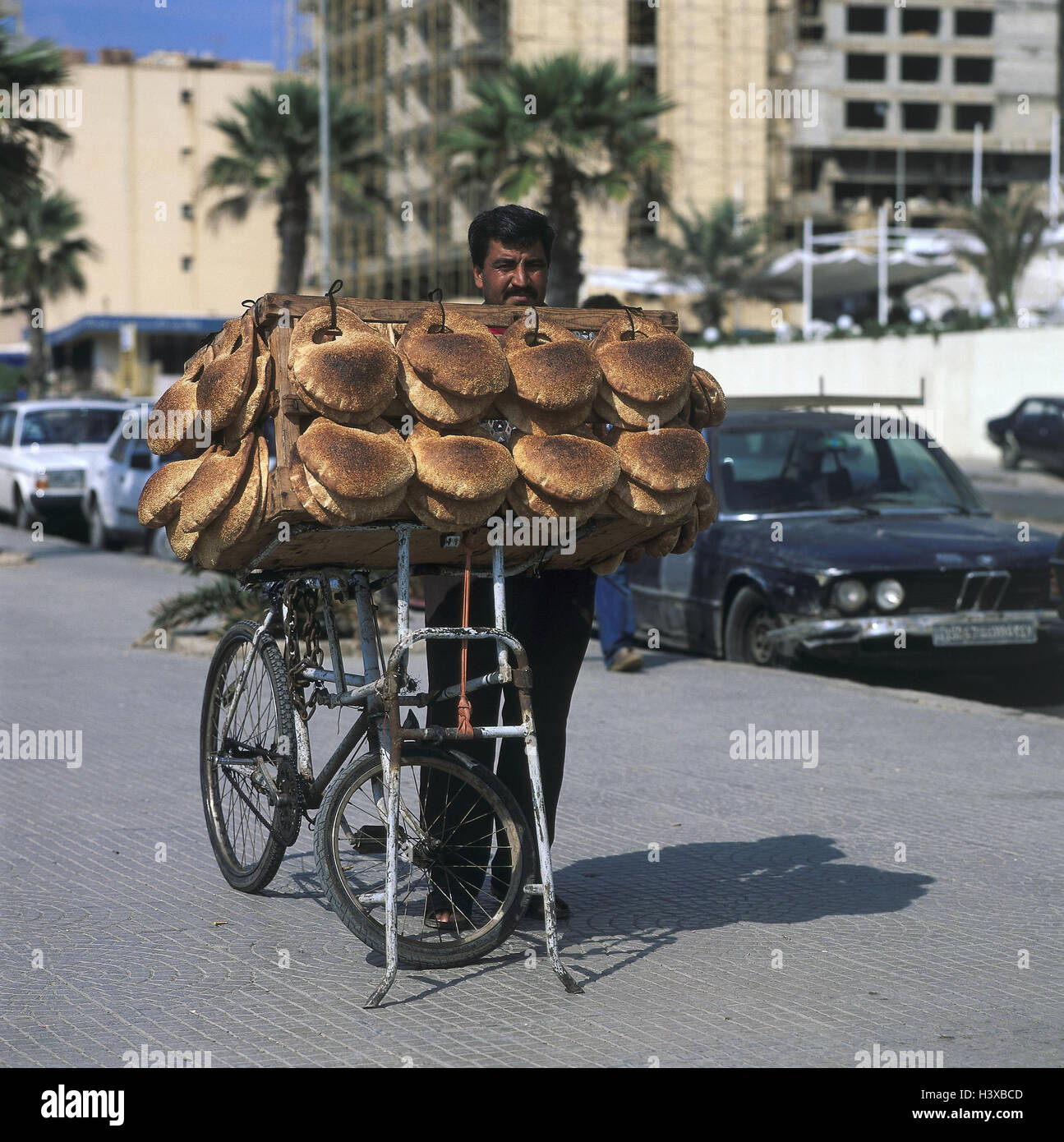 Lebanon, Beirut, man, bicycle, cakes and pastries, the Near East ...