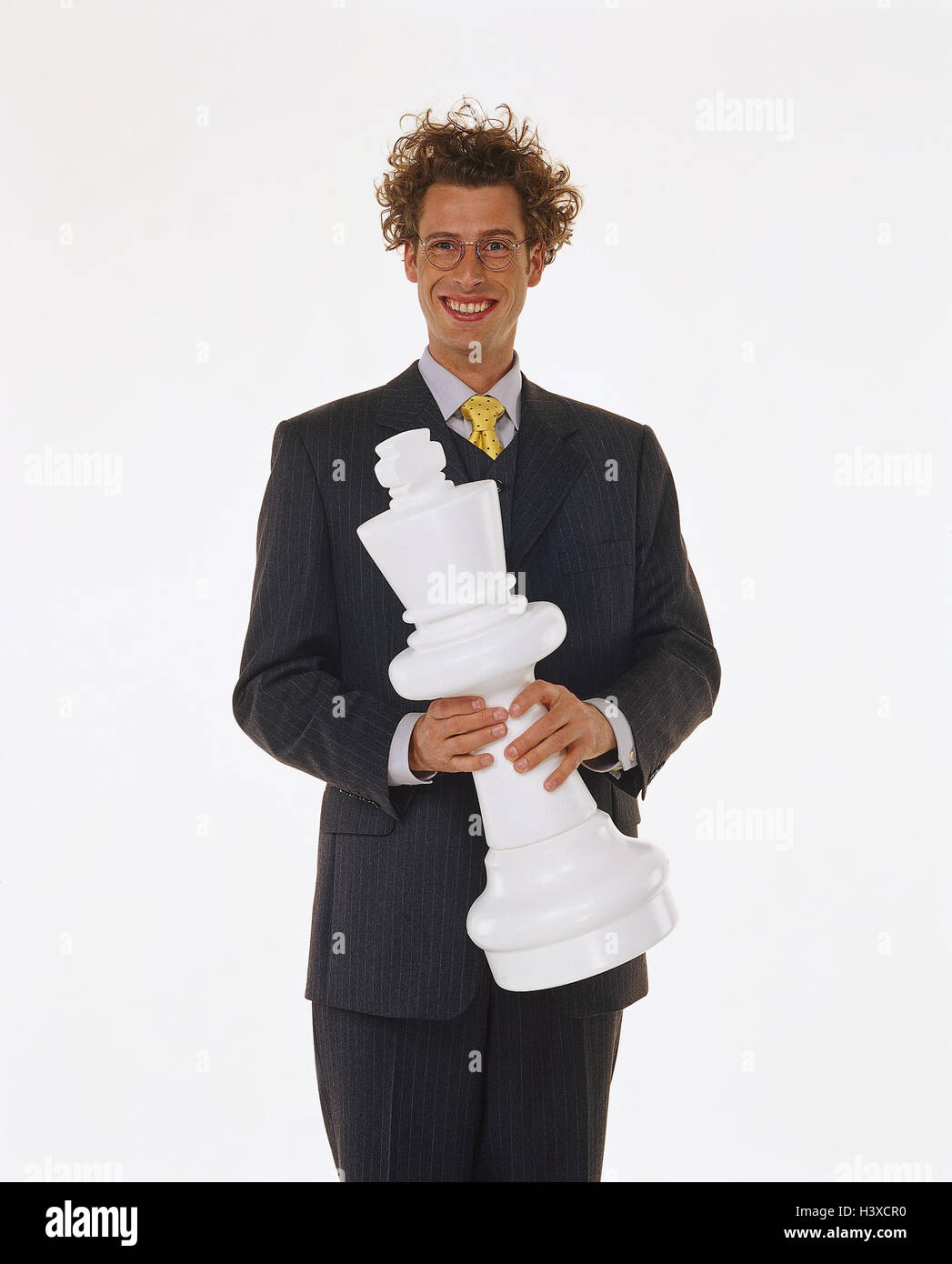 Man, young, suit, glasses, smile, chess piece, "king", outsize concepts ...