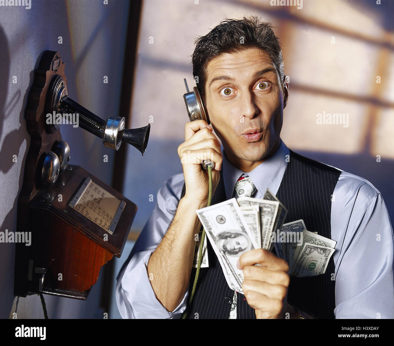 Nostalgia, man, call up, hold banknotes, facial play, joy, is surprised ...