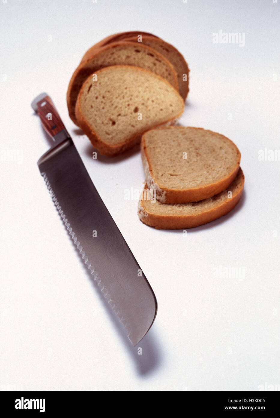 Loaf bread, slices bread, knives product photography, kitchen utensil ...