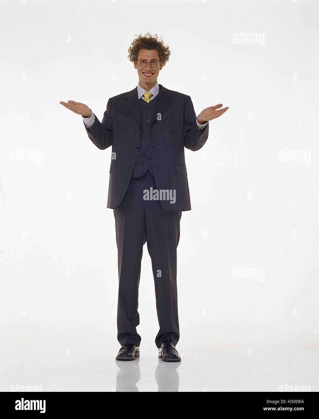 Man, young, glasses, suit, gesture, calmly, unsuspectingly, innocently ...