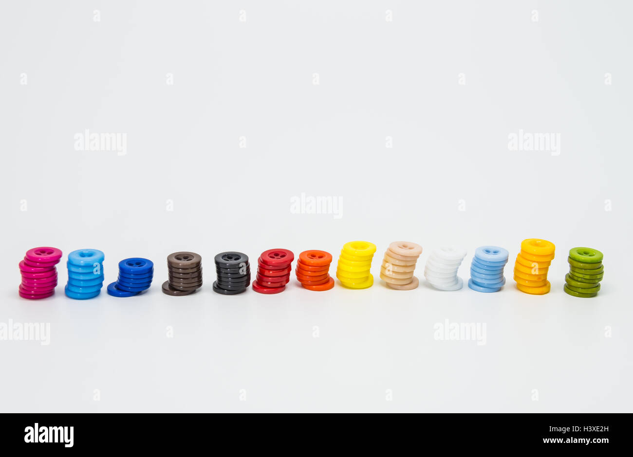 Sequence column of colorful button on white background and selective ...