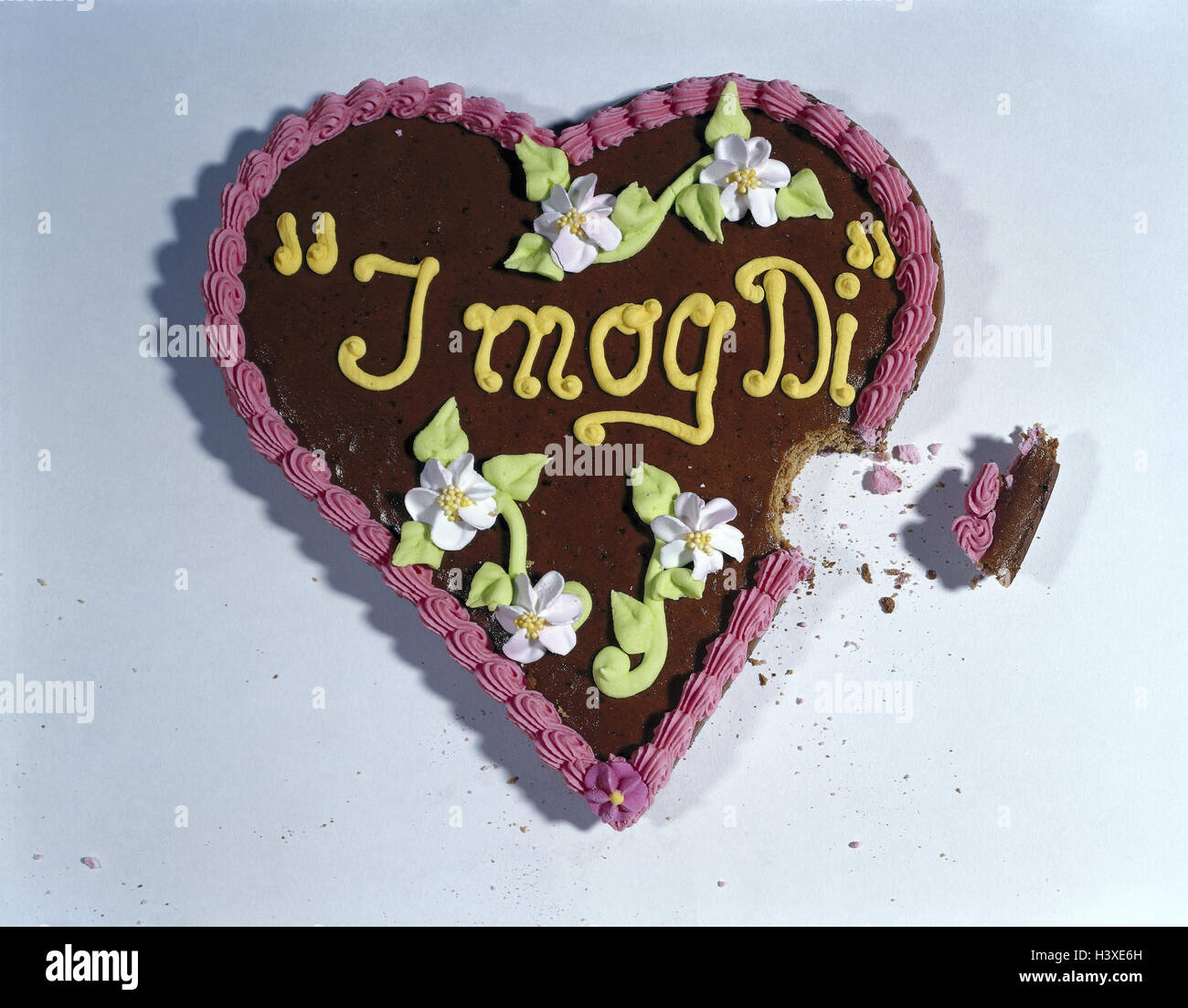 Gingerbread heart, bitten into, stroke, "I mog Tu", declaration love ...