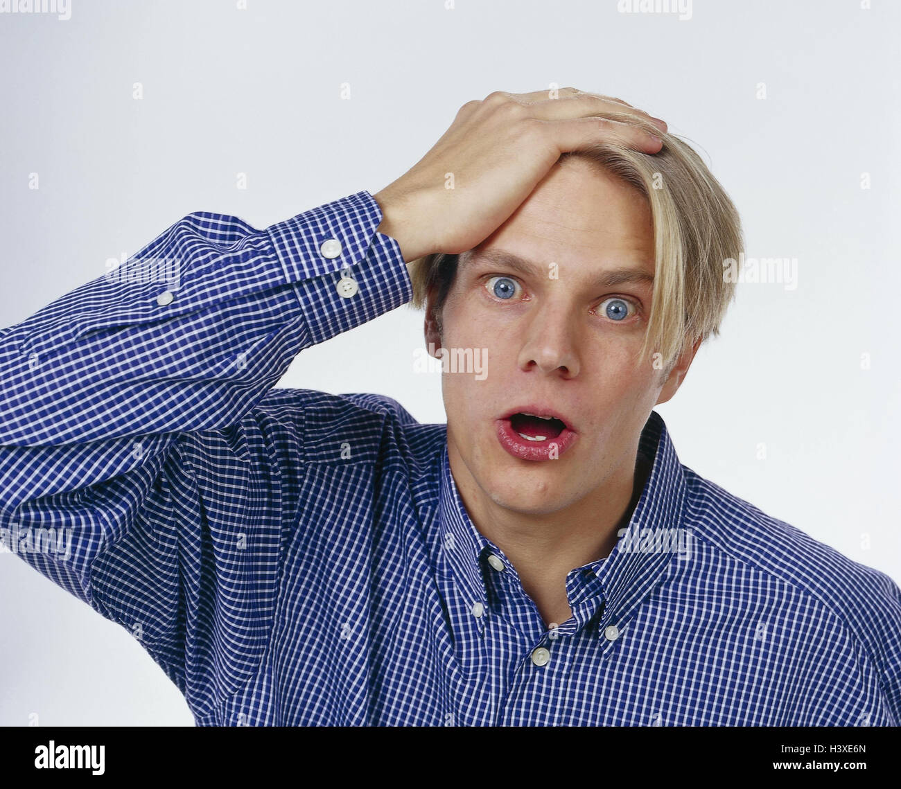 Man, young, blond, gesture, hand, forehead, surprise, fright, portrait ...