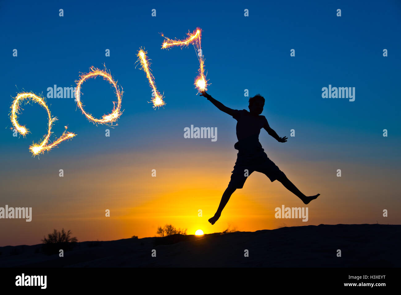 Jumping boy silhouette hi-res stock photography and images - Alamy