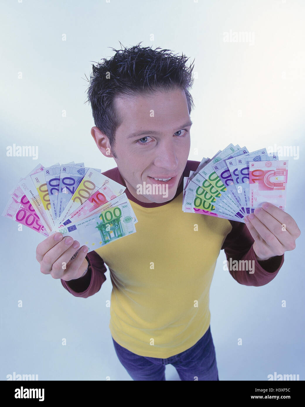 Man, hands, euro, bank notes, half portrait, inside, young, careless ...