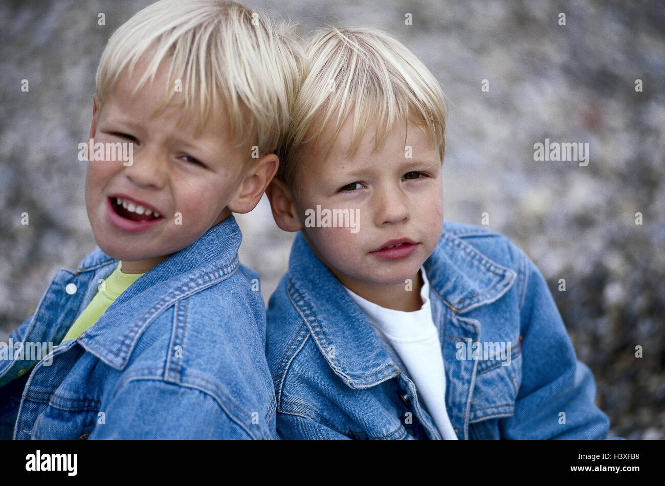 Two boys lean hi-res stock photography and images - Alamy