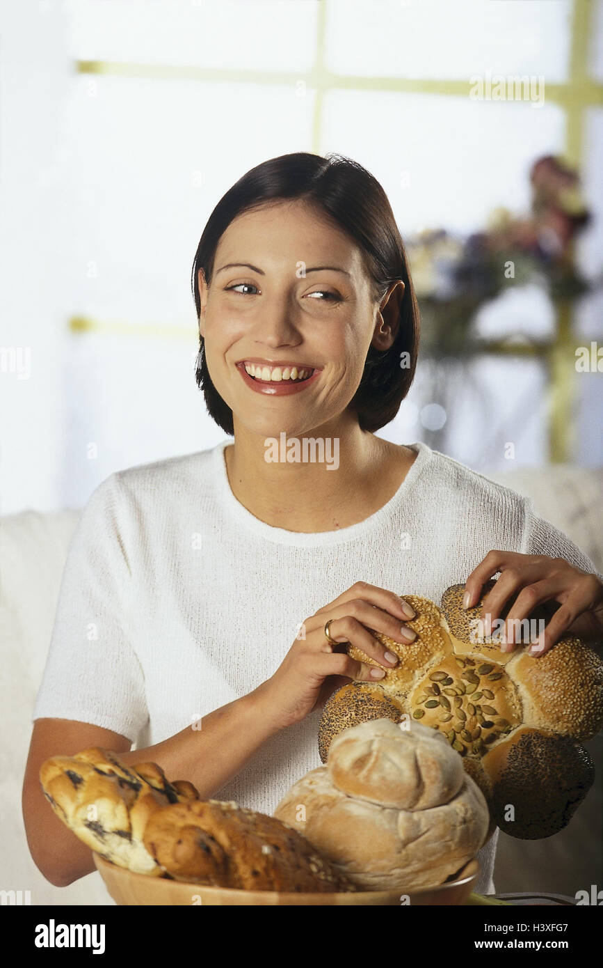 Woman, bread basket, bread roll, facial play, smile, fill up portrait ...