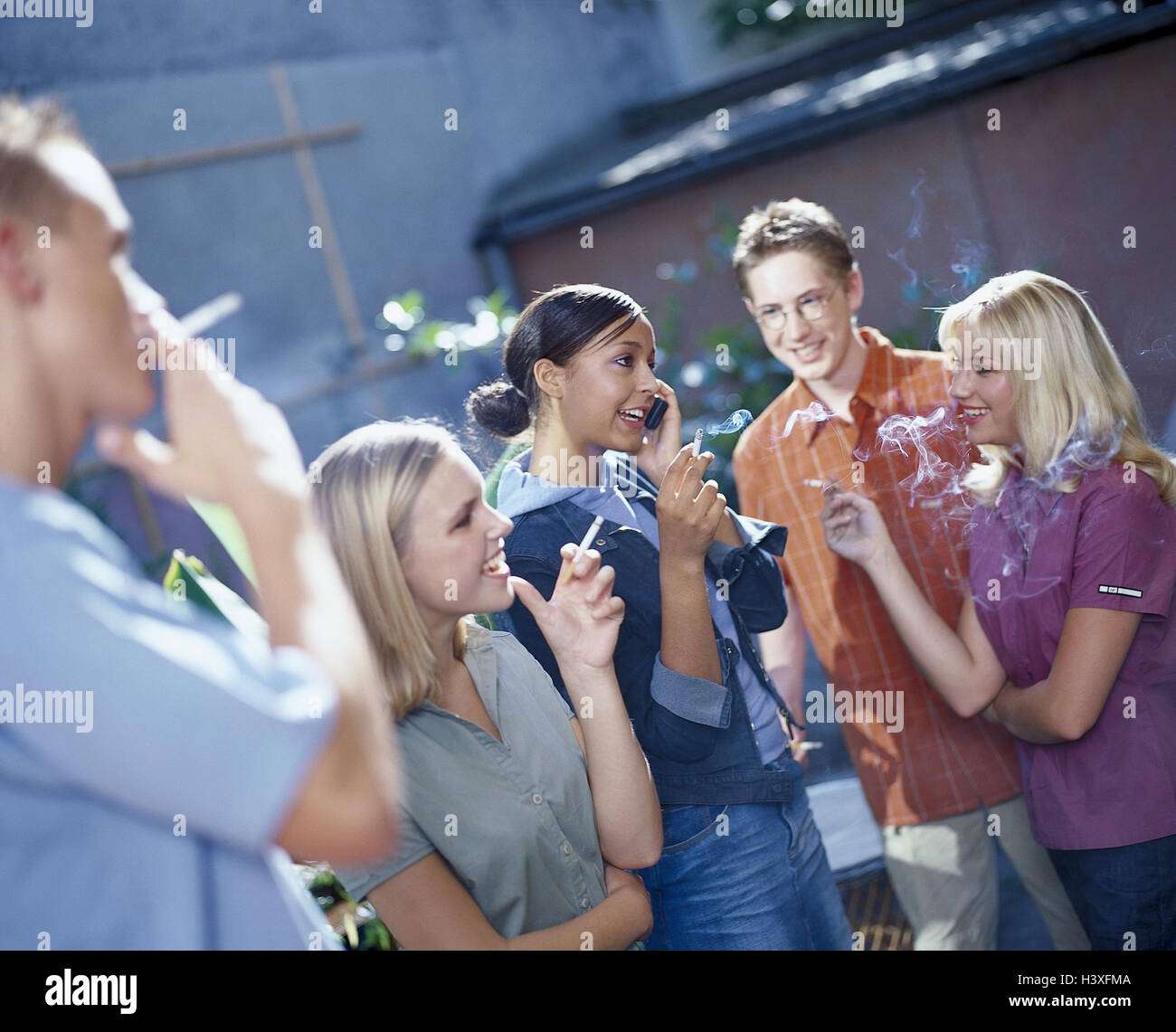 Young persons, cigarettes, smoke, mobile phone, call up, teenager ...