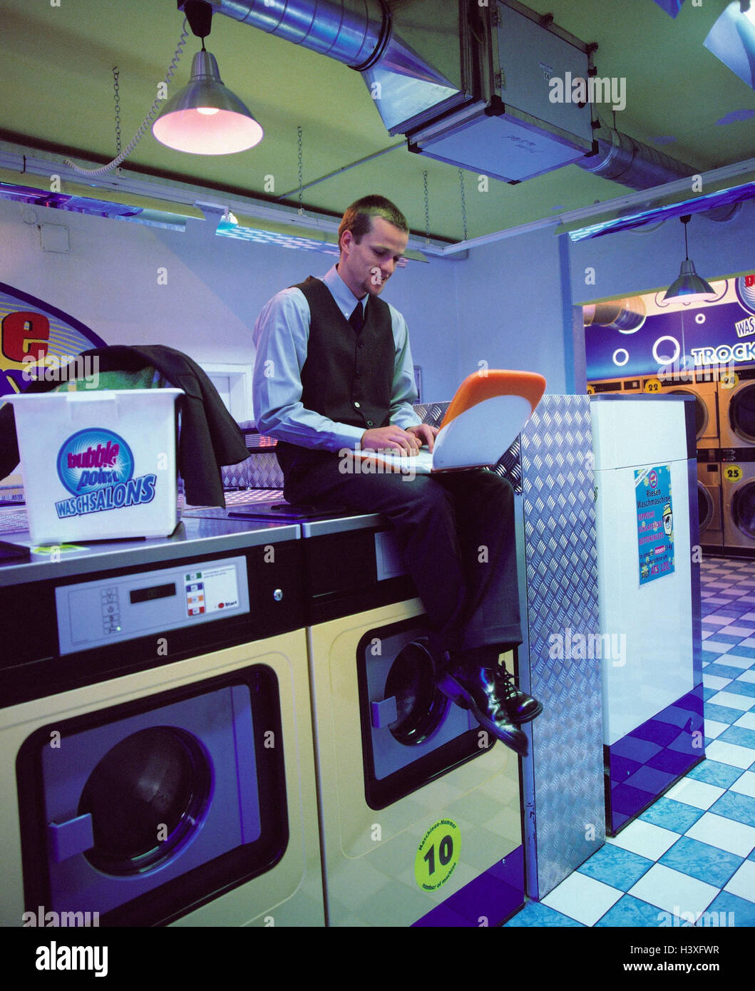 Launderette, businessman, iBook, coin laundry, coin launderette ...