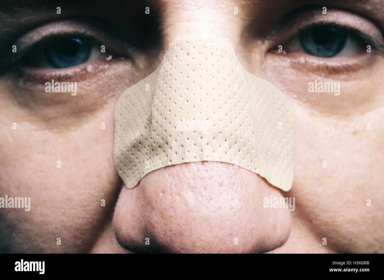 Man, look, detail, injury, adhesive plaster, nose, model released ...