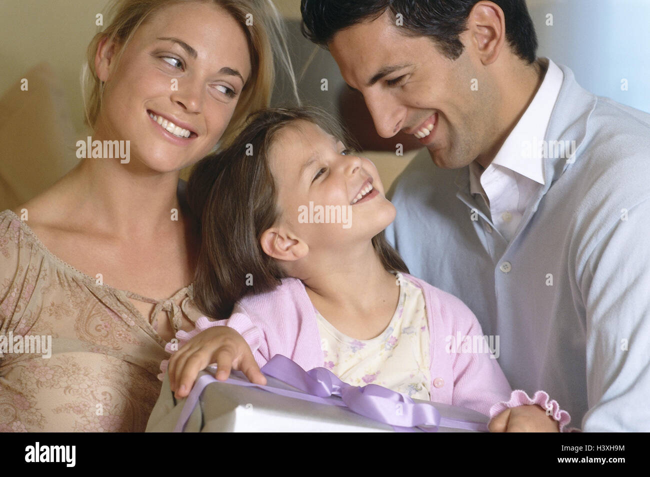 Parents, subsidiary, present, happy, eye contact, detail, model ...