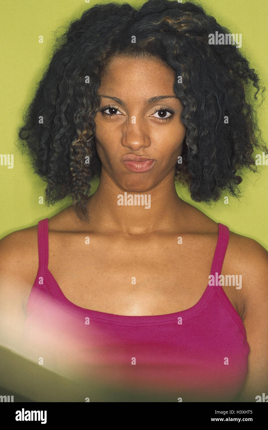 Woman, young, dark-skinned, facial play, uncertainly, interrogatorily ...