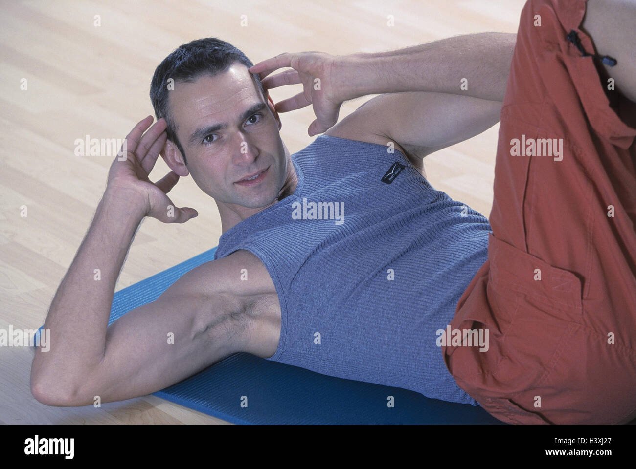 Man, lie, floor, gymnastics exercises, detail, leisure time, hobby ...