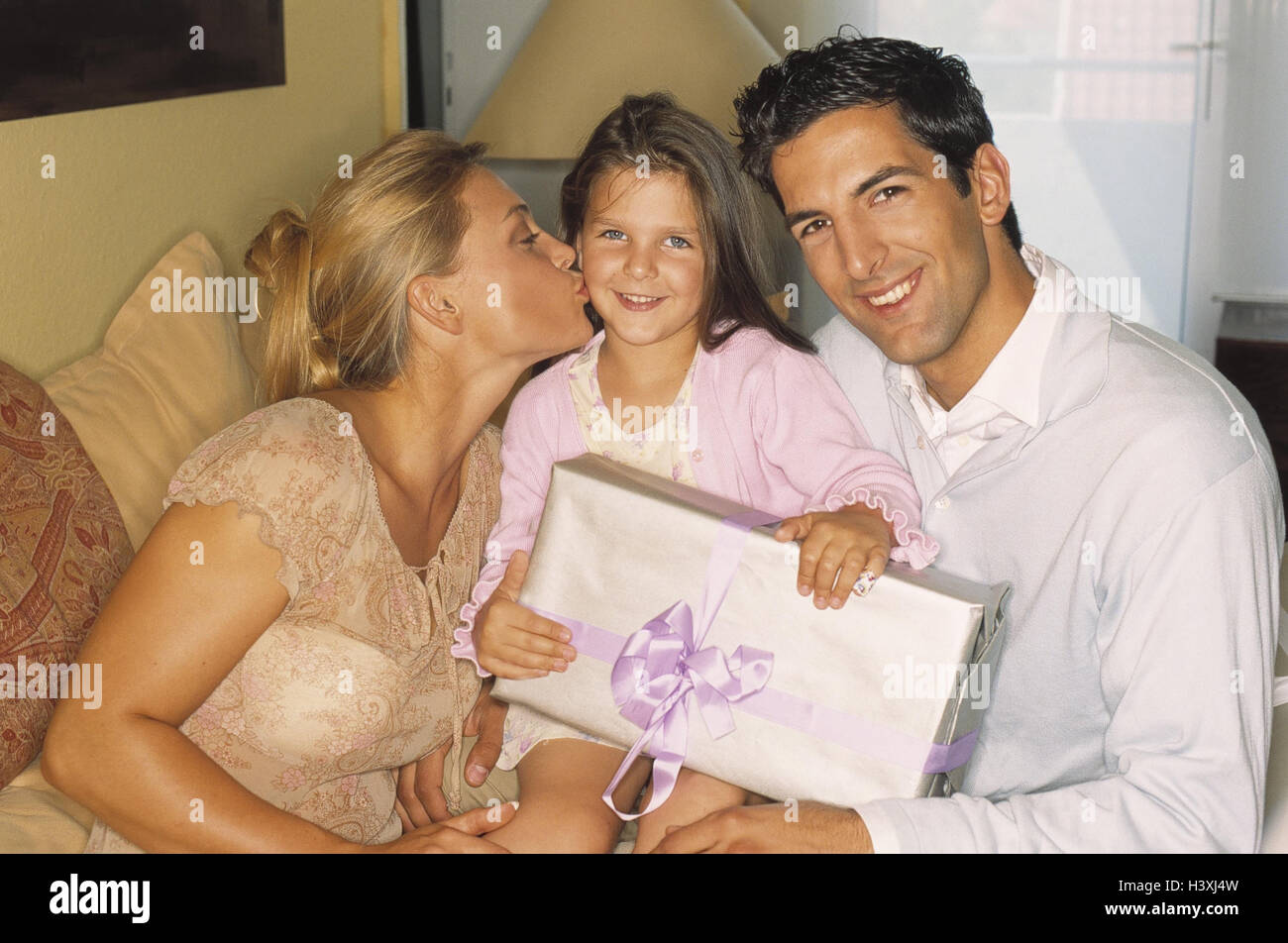Parents, subsidiary, present, happy, portrait, model released, family ...