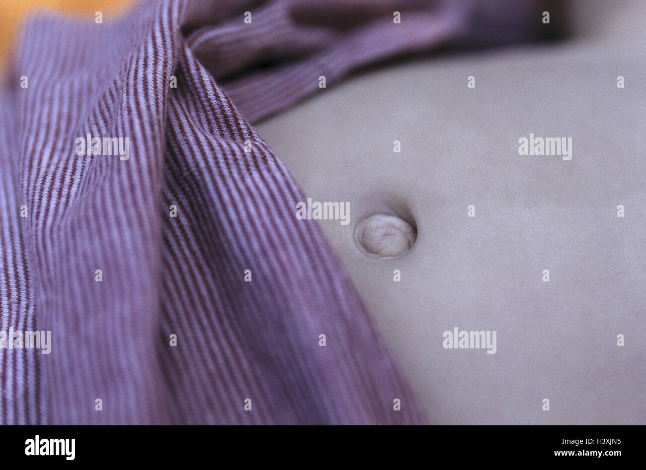 Child belly button not pregnant hi-res stock photography and images - Alamy
