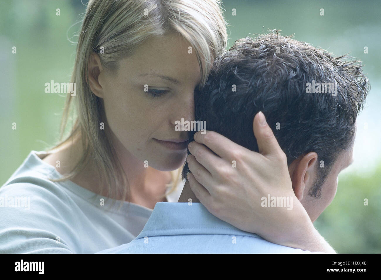 Couple embrace consolation hi-res stock photography and images - Alamy