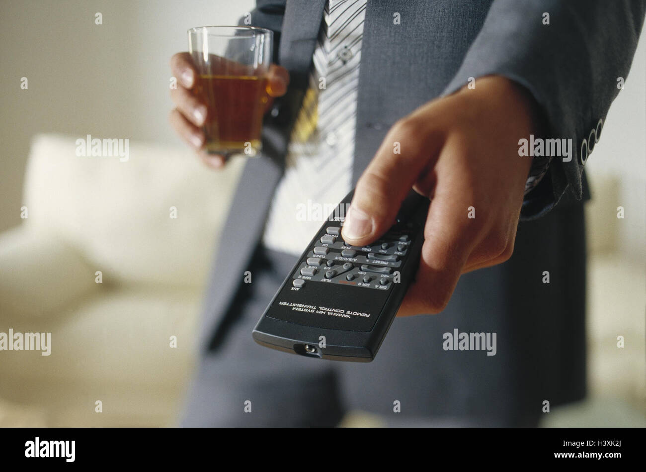 Living space, man, drink, glass, remote control, detail, glass, drink ...