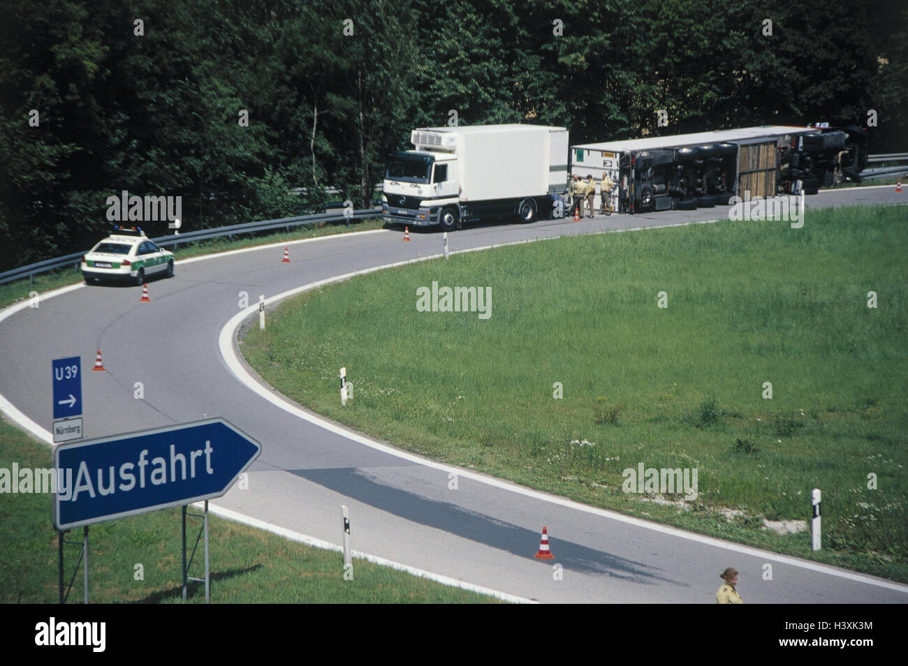 Motorway exit, accident, truck, fallen down, police car street, traffic ...