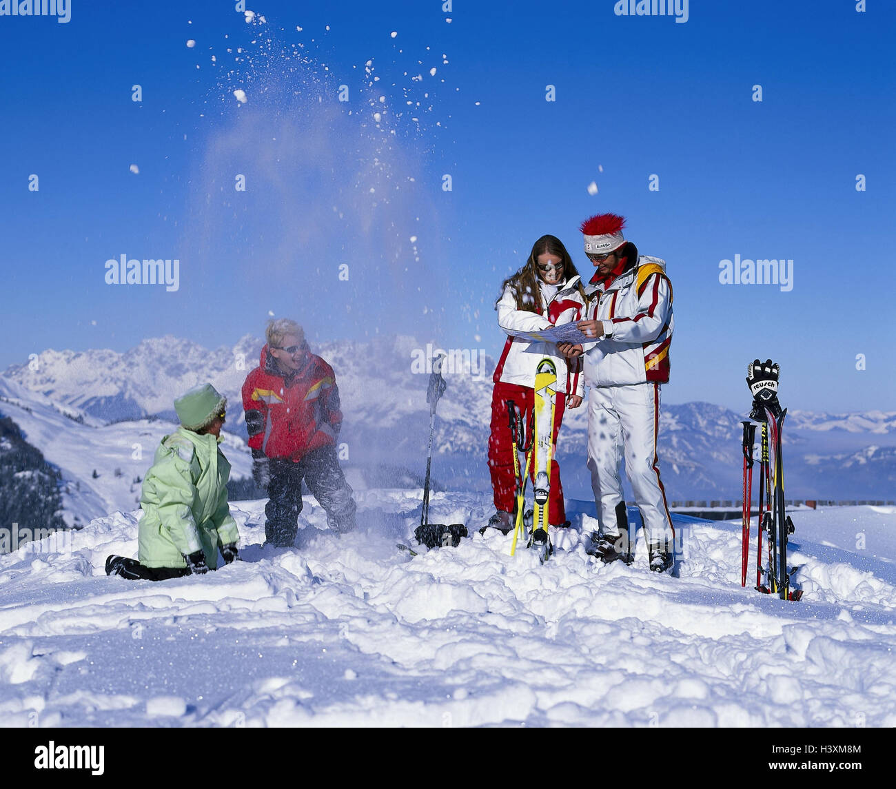 Mountain landscape, family, ski equipment, map, orientation, mountains ...