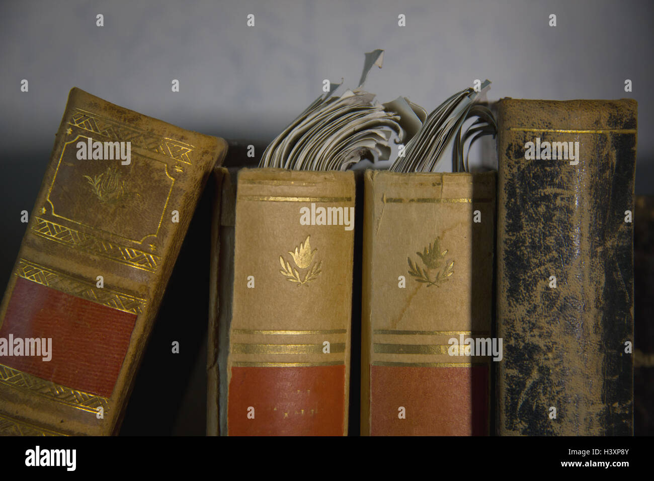 Old books with a lot of paper bookmarks Stock Photo - Alamy