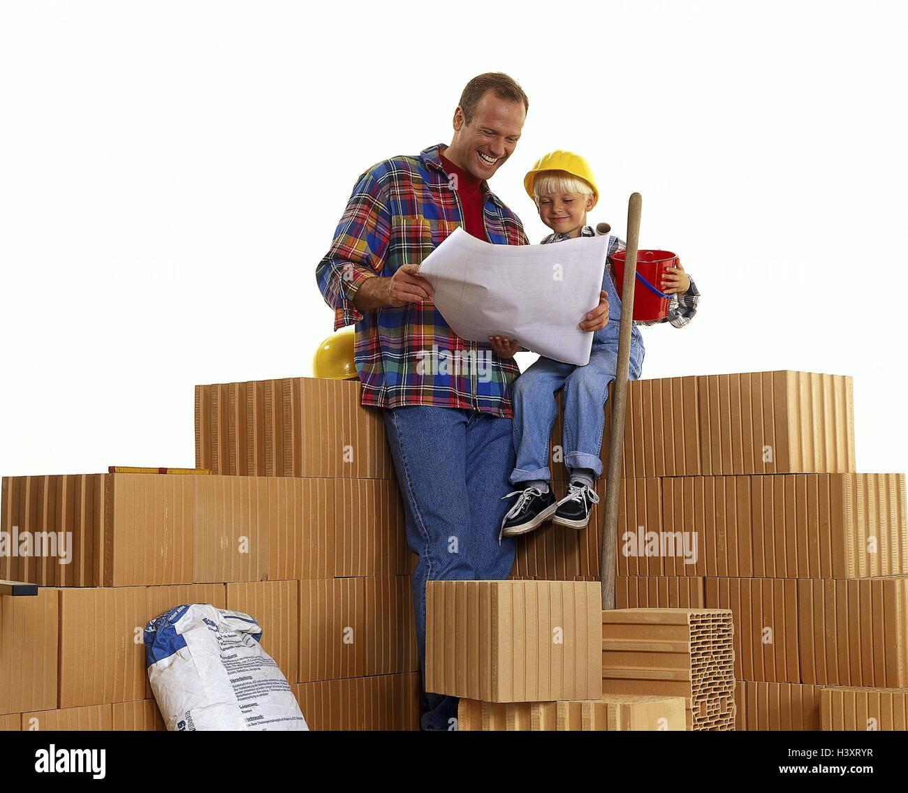 Building of a house, father, son, building material, red bricks ...