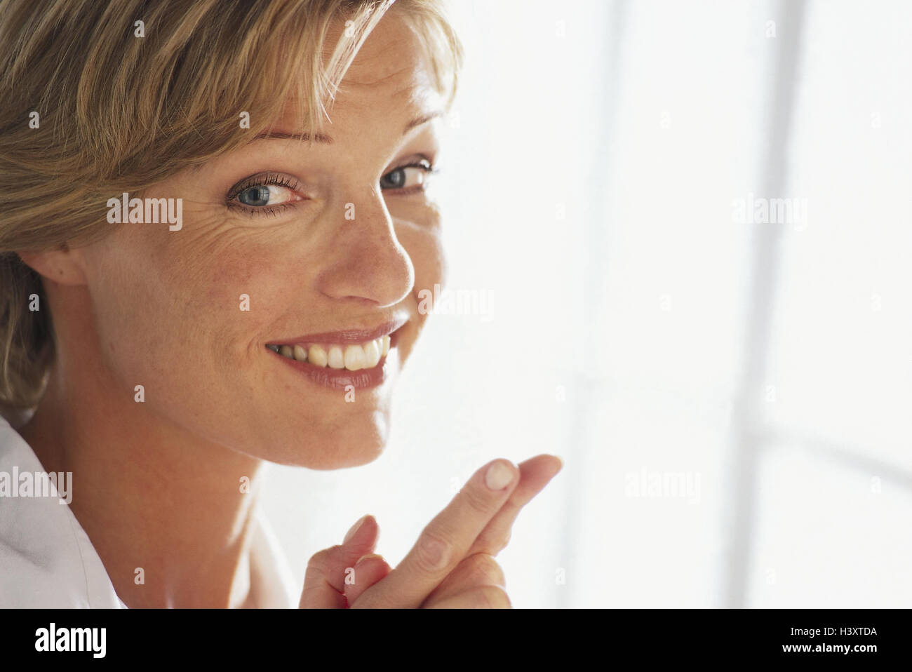 Woman, smile blond, happy, gesture, portrait, women, inside, side view ...