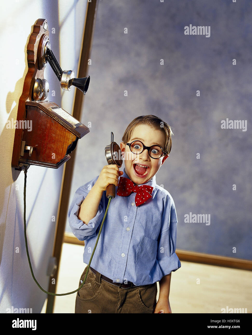 Nostalgia wall phone boy hi-res stock photography and images - Alamy