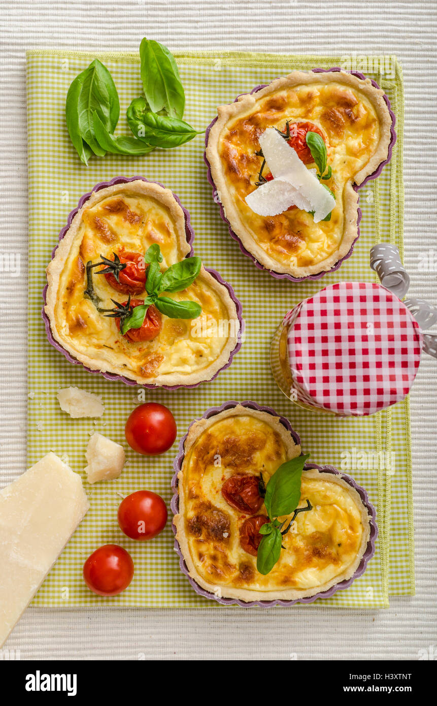 Quiche with cheese and cherry tomatoes on st Valentine for my love ...