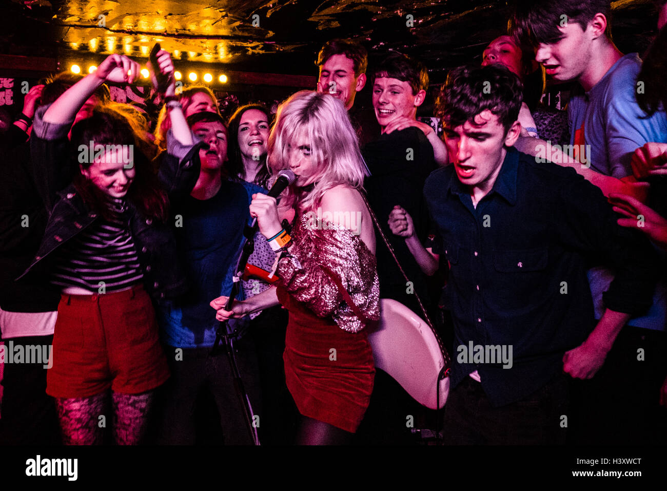 Izzy B. Phillips of Black Honey with crowd on stage during a ...