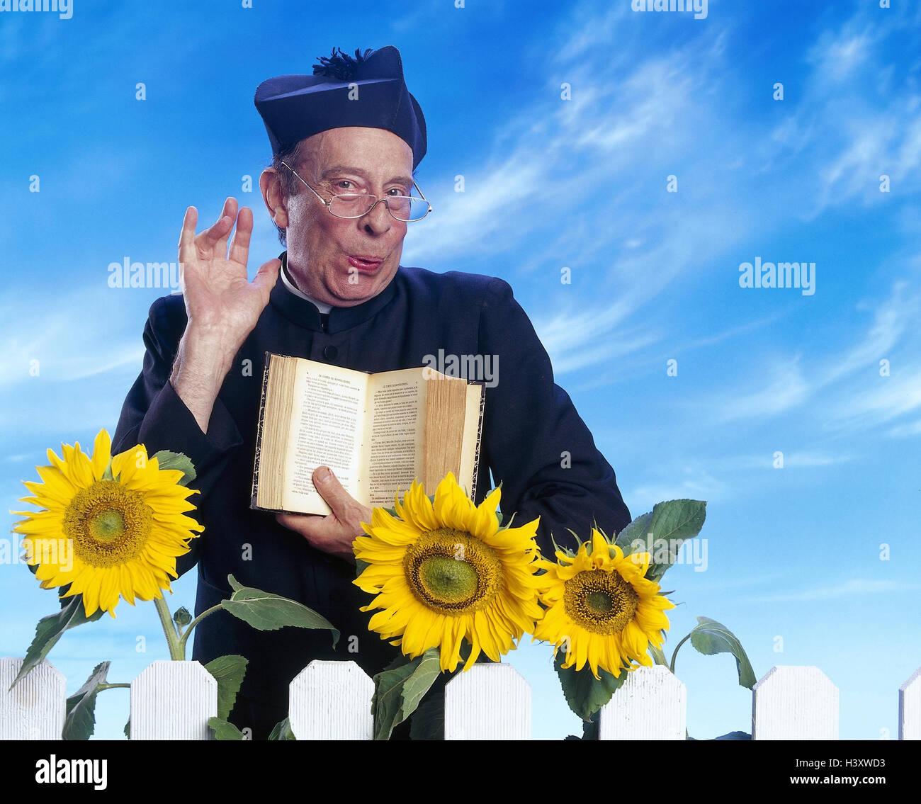 Garden fence, sunflowers, priests, Bible, gesture, half portrait ...