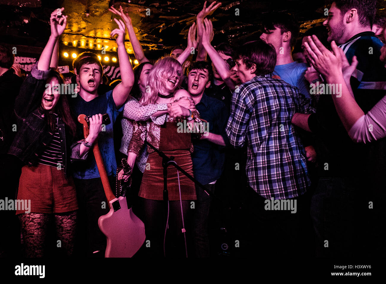 Izzy B. Phillips of Black Honey with crowd on stage during a ...