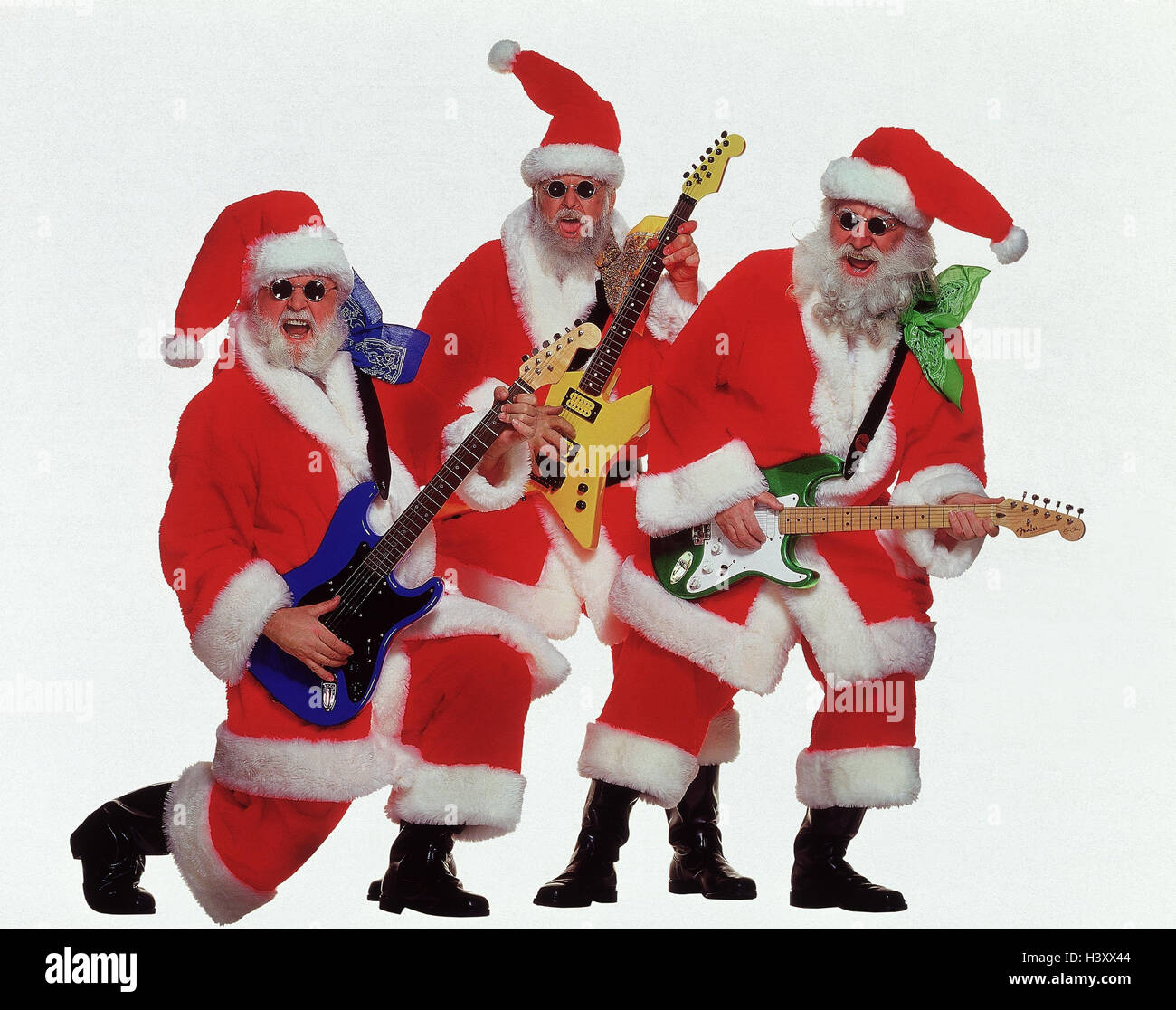 Three santas hi-res stock photography and images - Alamy