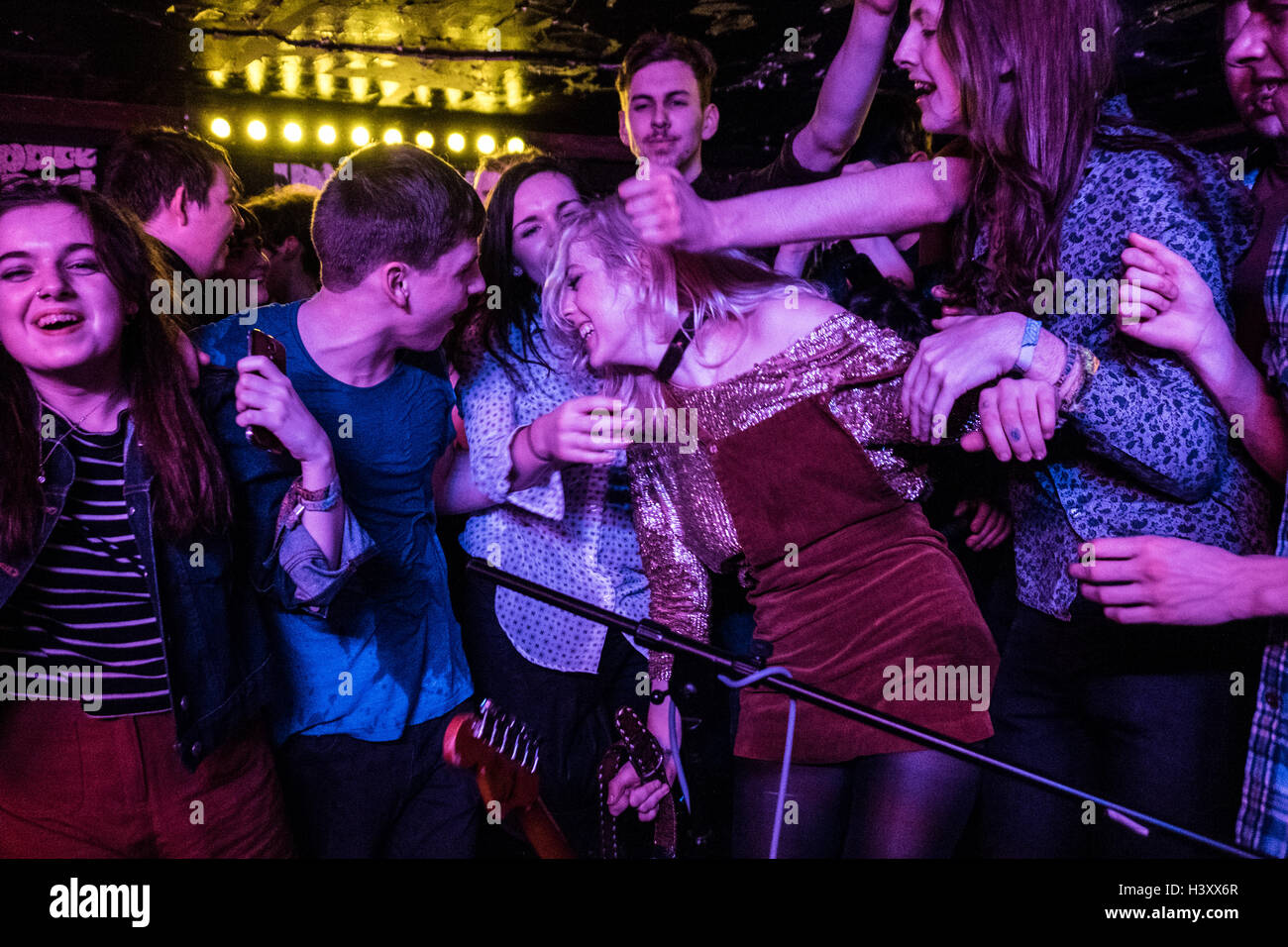 Izzy B. Phillips of Black Honey with crowd on stage during a ...