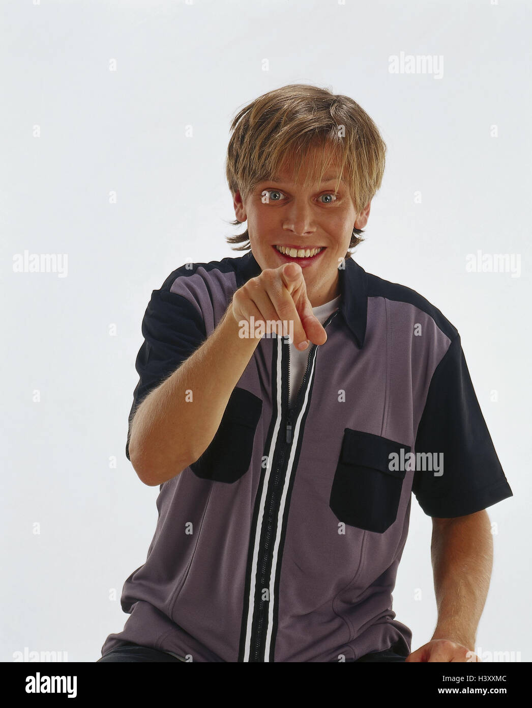 Teenager's boy, blond, laugh, interpret gesture, forefinger, half ... Teenager's boy, blond, laugh, interpret gesture, forefinger, half ...