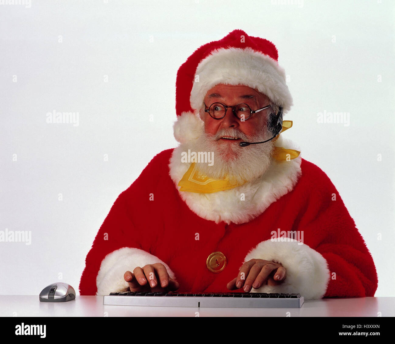 Santa Claus, headset, keyboard, half portrait, studio, cut out, glasses ...