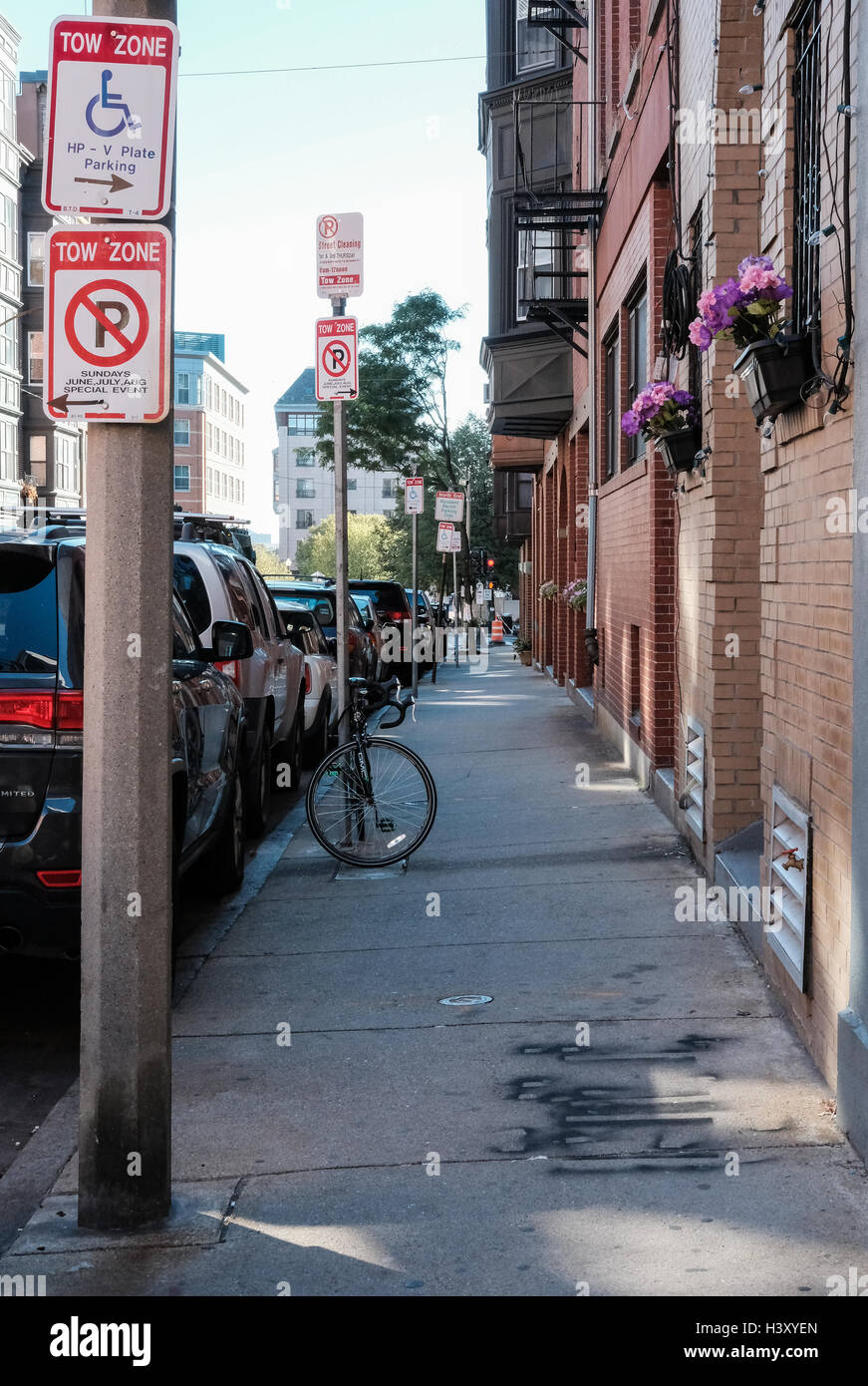 Urban street view of downtown Boston, MA, USA. Image shows parking ...