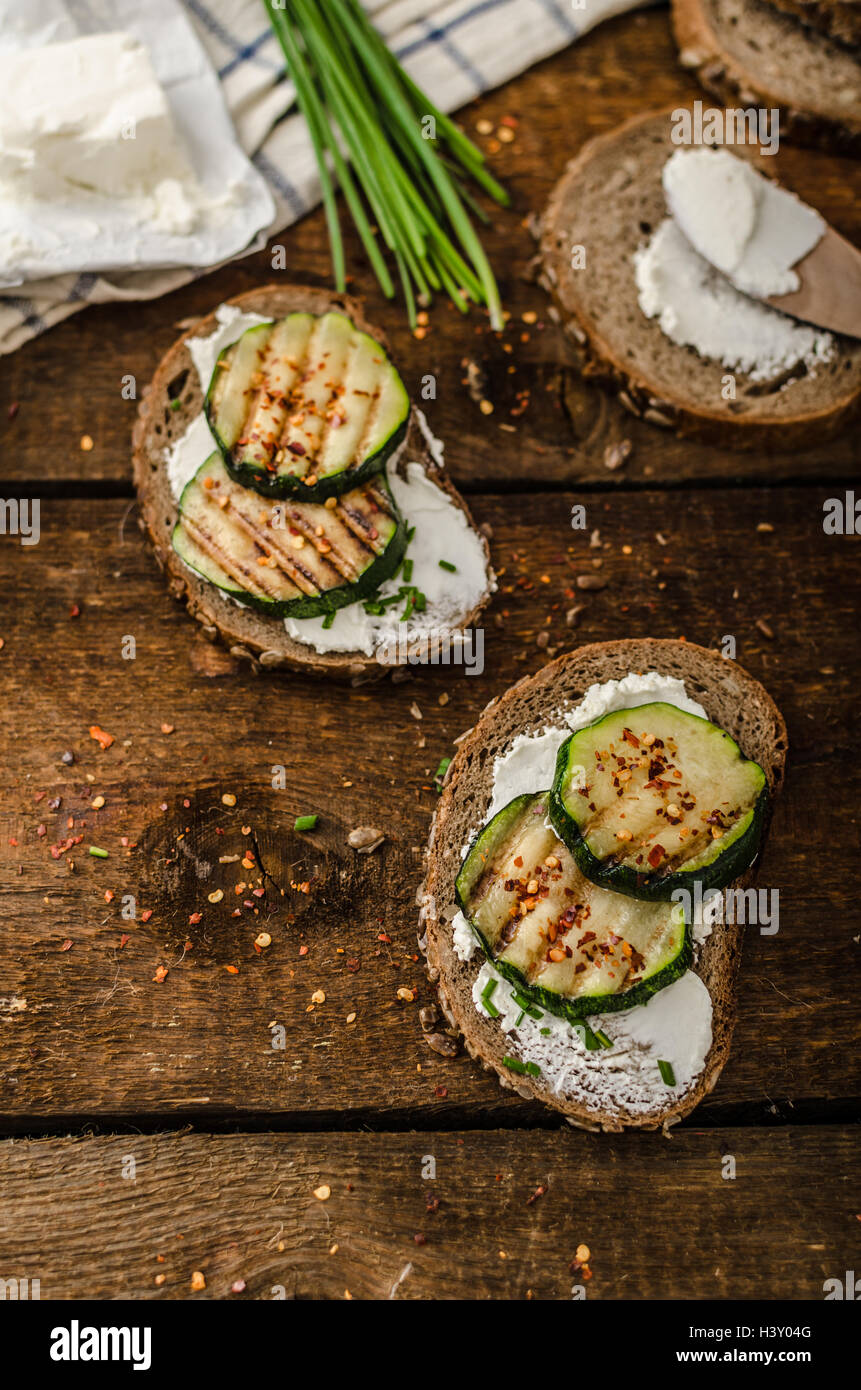 Healthy breakfast - seeds bread spread by cream cheese and grilled ...