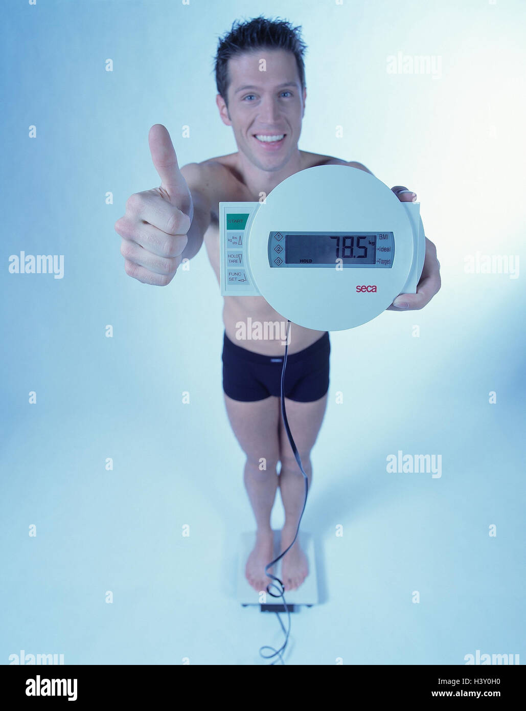 Man, boxers, bathroom scales, gesture, ideal weight, inside, young ...