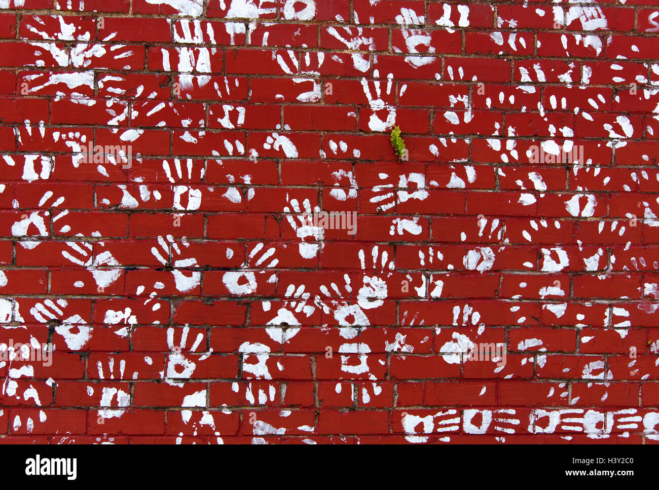 The red brick wall with hand marks on it (Dunedin, New Zealand Stock ...