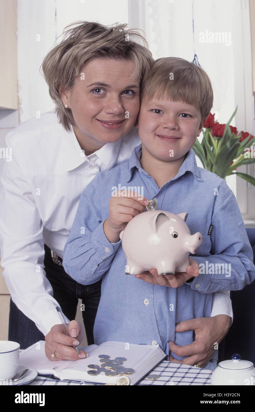 Mother, son, piggy bank, coins, throw in, model released, woman, child ...